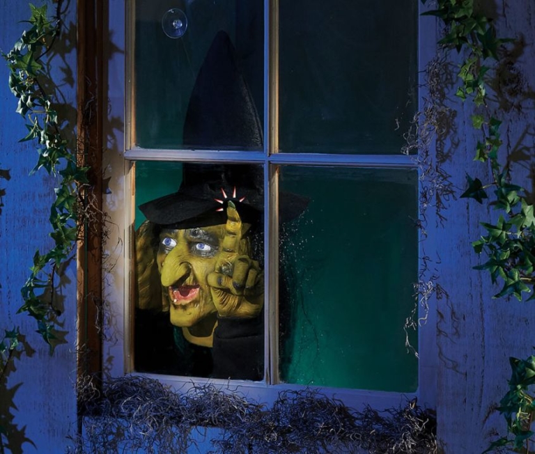 This Motion-Activated Window Witch will Creep out Trick-or-Treaters