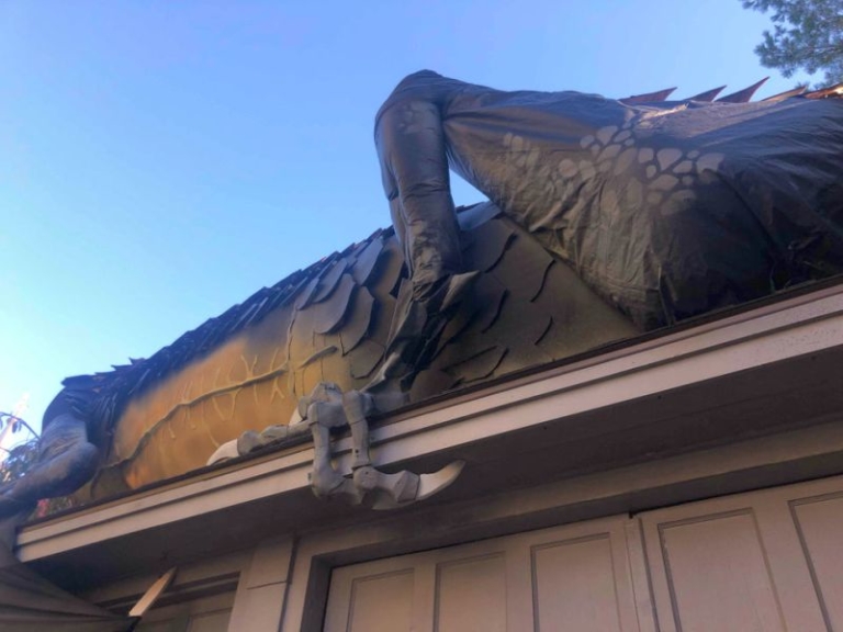 There’s a Gigantic Dragon Crawling on This Home’s Roof