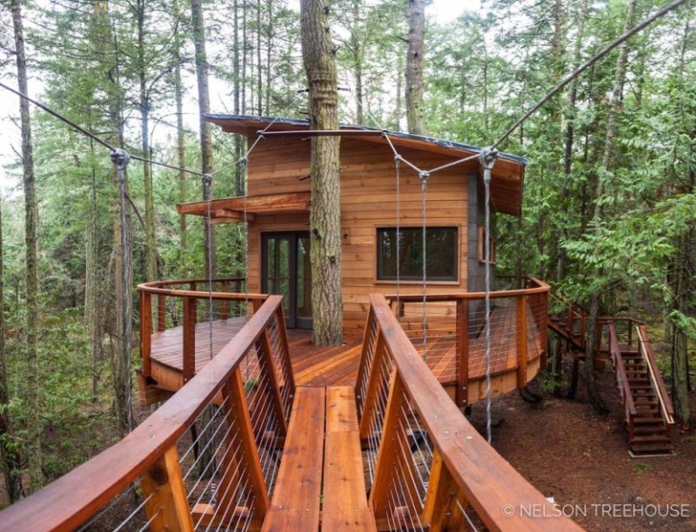 This Treehouse in San Juan Islands Features Fire Pole from Deck