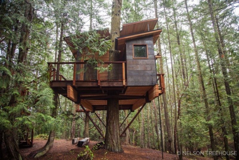This Treehouse in San Juan Islands Features Fire Pole from Deck