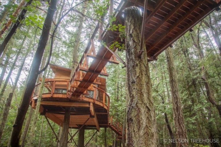 This Treehouse in San Juan Islands Features Fire Pole from Deck