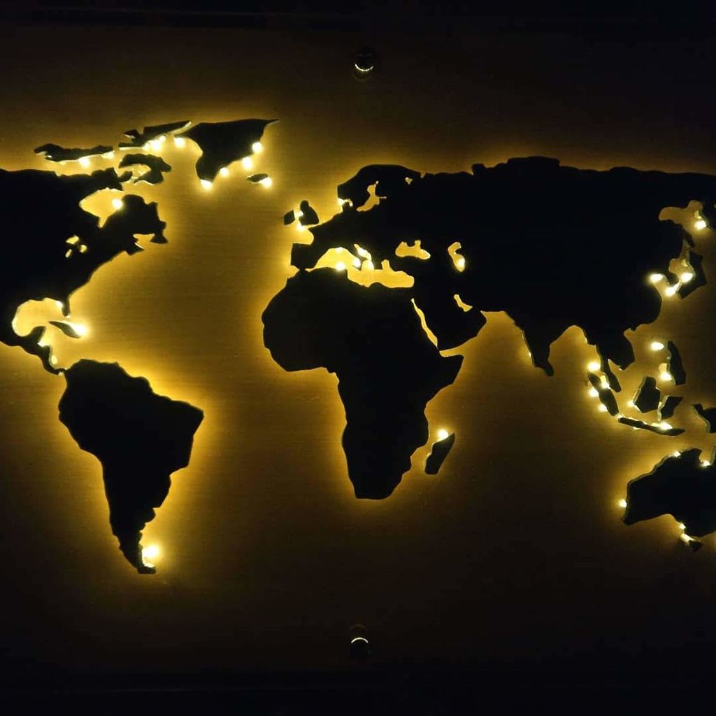 DIY-er Builds Coffee Table with Backlit World Map Beneath a Glass Top