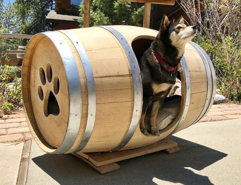Repurposed Wine Barrel Dog House with Paw Windows