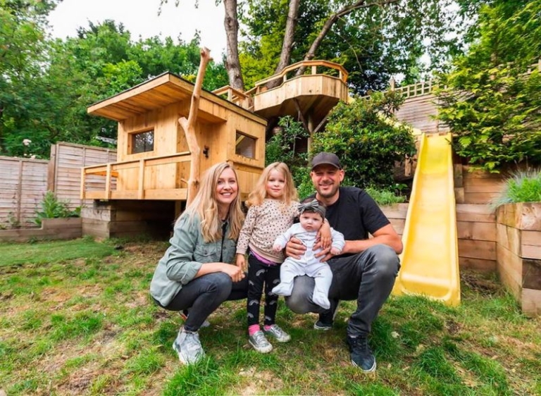 Dad Builds Garden Treehouse with Slides For His Daughters