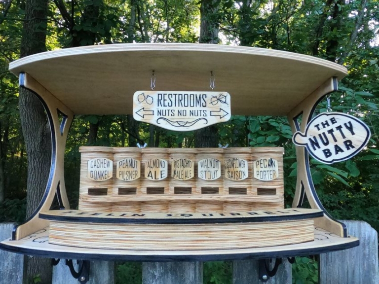 Woodworker Goes Viral with Adorable Bar for Squirrels