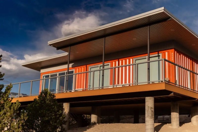 Orange Shipping Container Rental in Colorado with Epic Mountain Views