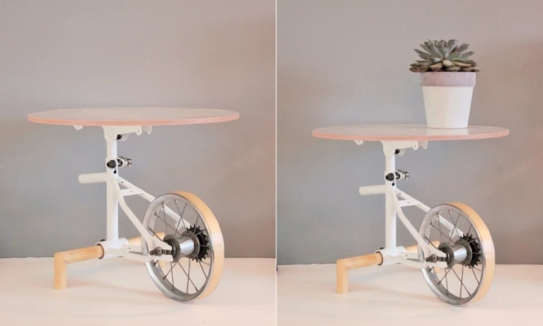 Designer Transforms Discarded Bicycle Into Coffee Table with White Motif