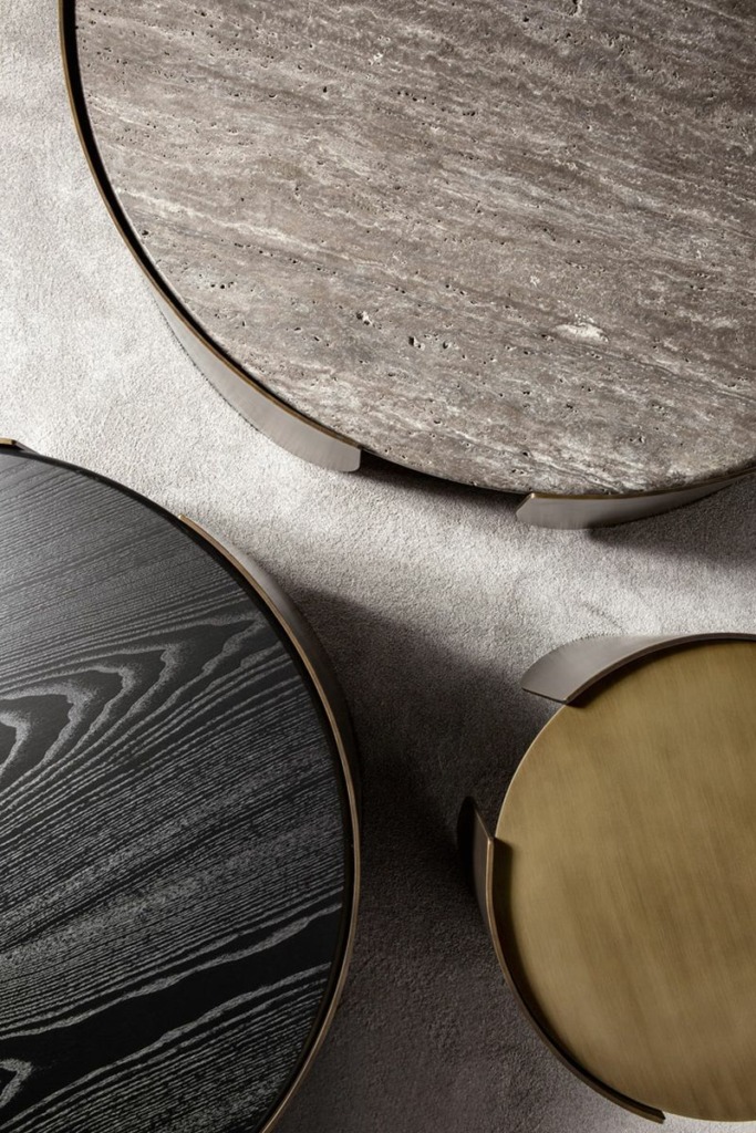 Three Curved Metal Bands Give This Coffee Table a Stylish Outlook