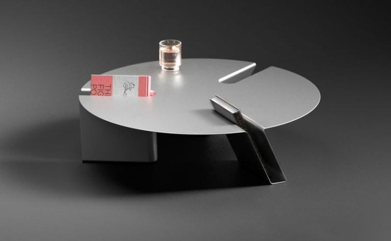 This Metal Table Comes With Legs That Double as Storage
