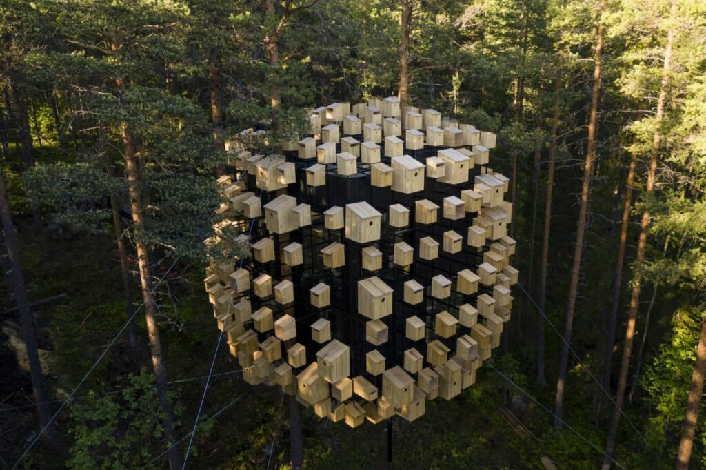 This Treehouse Hotel with a Façade of Birdhouses is Open for Visitors