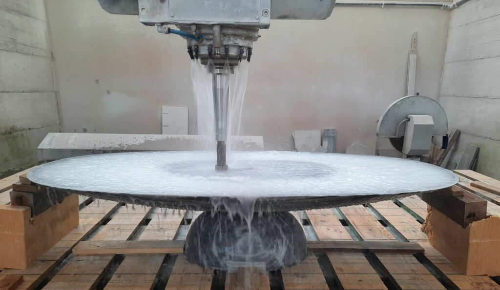 Karim Rashid's New Table is Classy Fusion of Marble and Glass