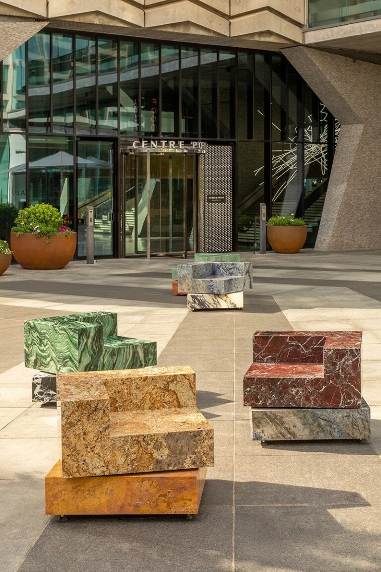 Series of Vibrant Natural Stone Chairs in St. Giles Square, London