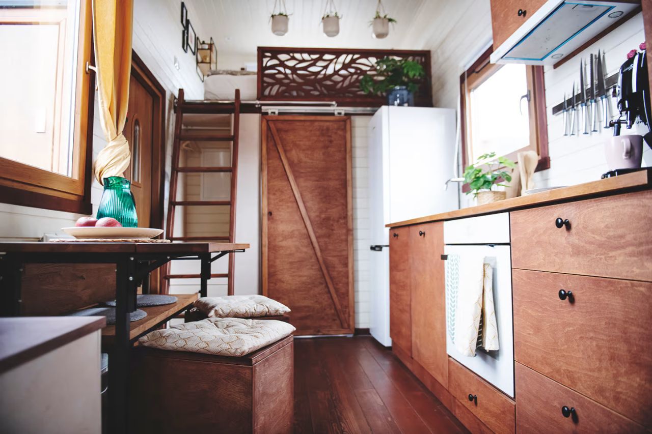 Elise Tiny House on Wheels Features a Raised Living Room
