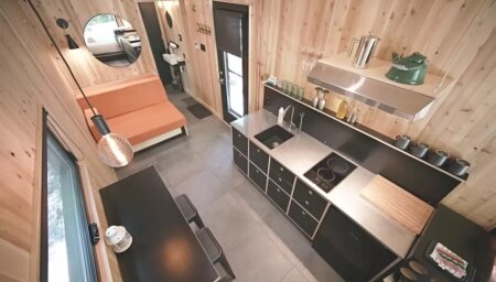 Shipping Container Cabin With Convertible Sofa and Wine Rack