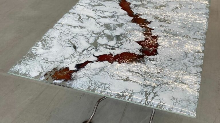 Rust Becomes the Artist's Ally in Roots Dining Table
