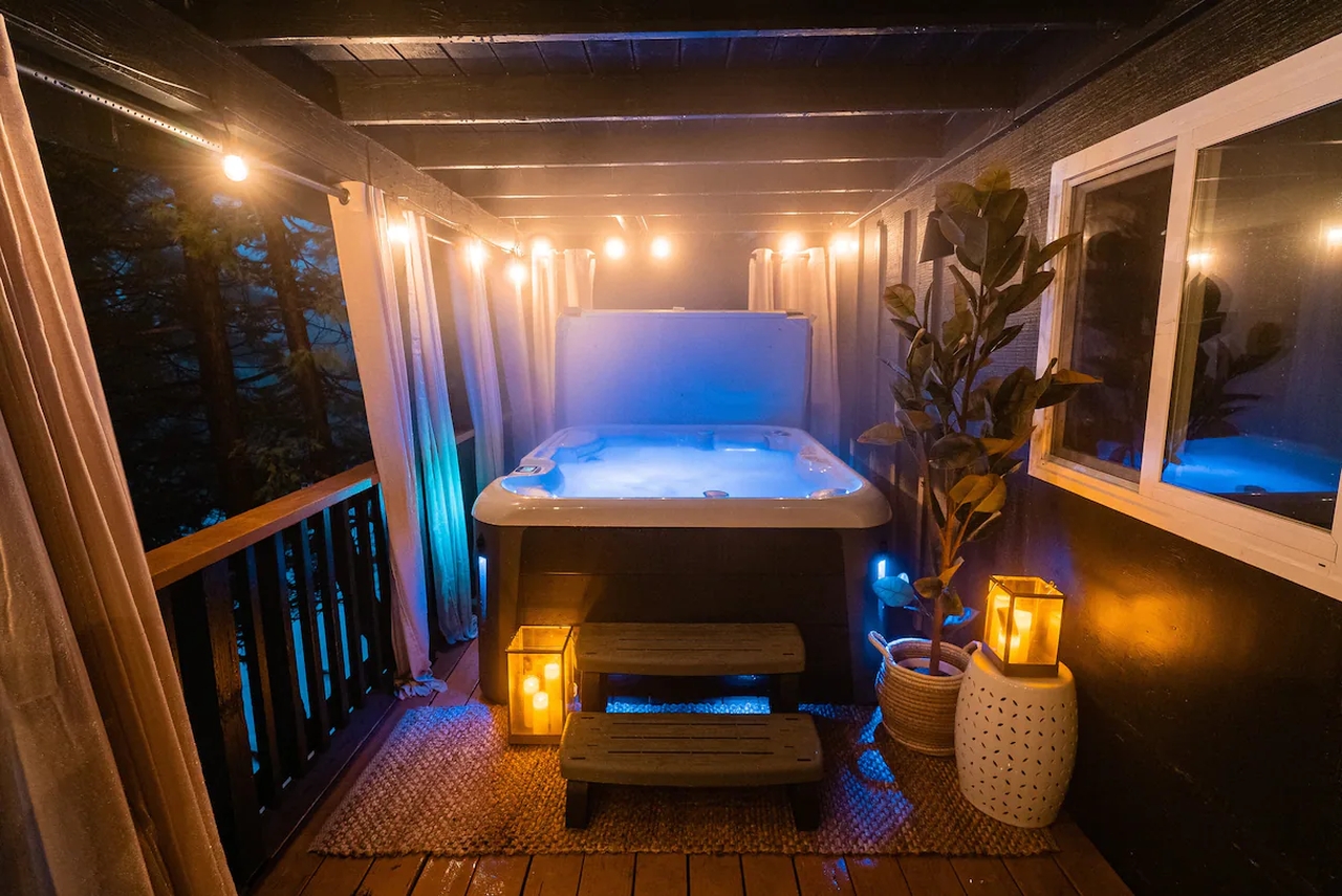 Lightfoot Cabin has Theater Room Hidden Behind Bookcase Door