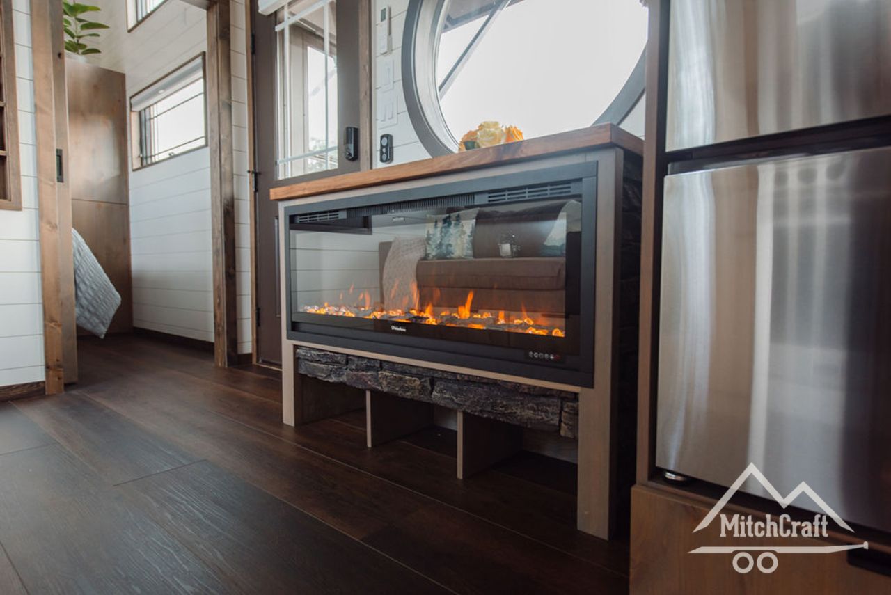 Lisa's 30 x 10 Tiny Home with Balcony is Spaciously Beautiful