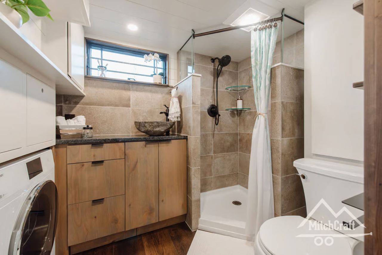 Lisa's 30 x 10 Tiny Home with Balcony is Spaciously Beautiful