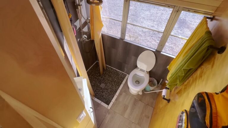 This 40-ft School Bus Conversion has Two Home Offices