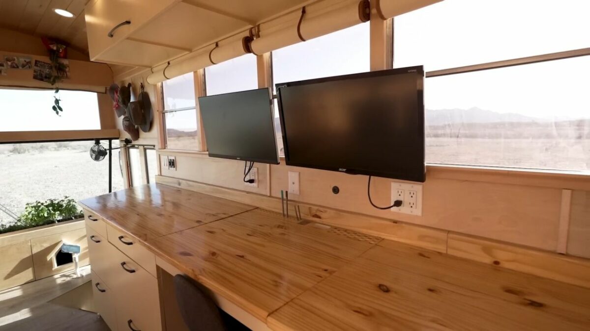 This 40-ft School Bus Conversion has Two Home Offices