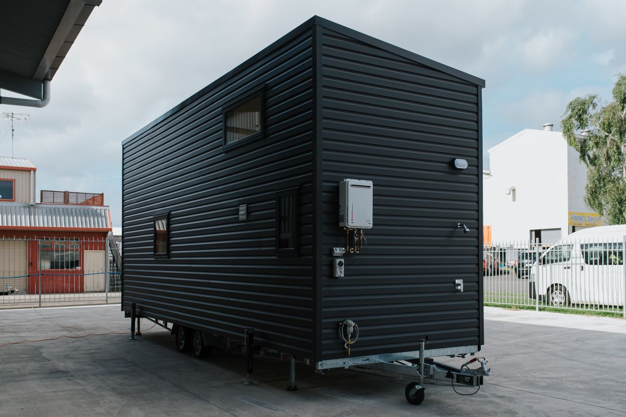 Build Tiny Creates Home Haven with Dual Lofts, Private Staircases