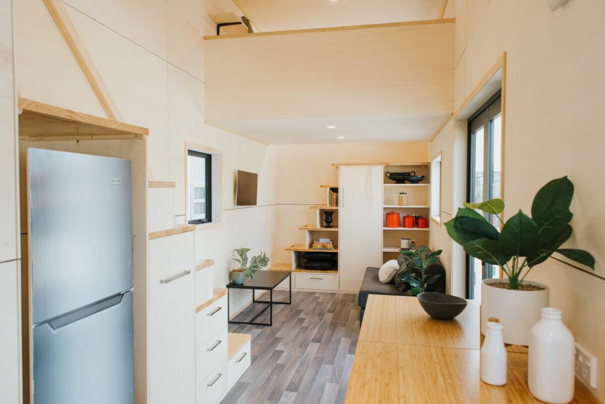 Build Tiny Creates Home Haven with Dual Lofts, Private Staircases