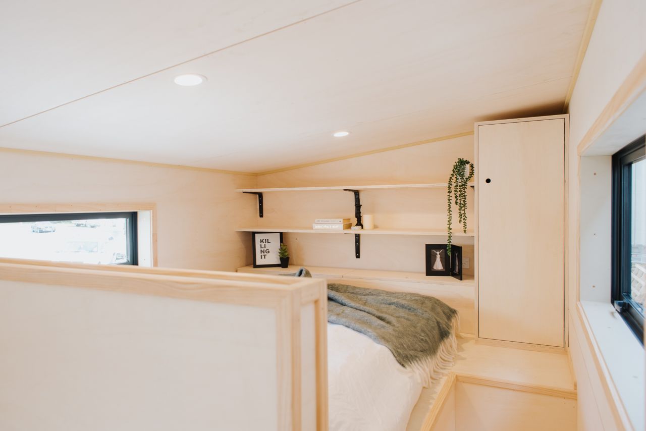 Build Tiny Creates Home Haven with Dual Lofts, Private Staircases
