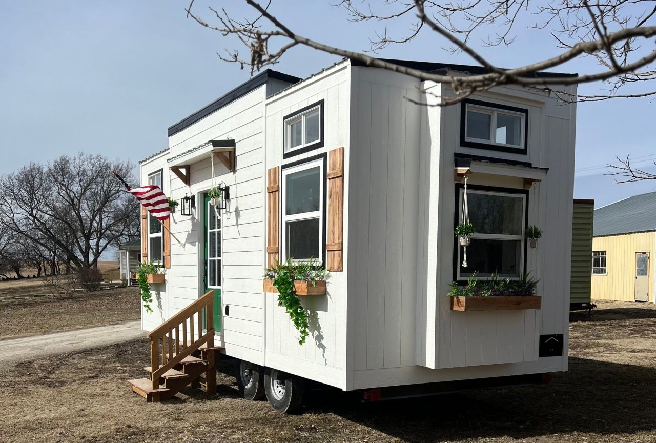 The Georgia Tiny House With Farmhouse Vibe has Twin Lofts
