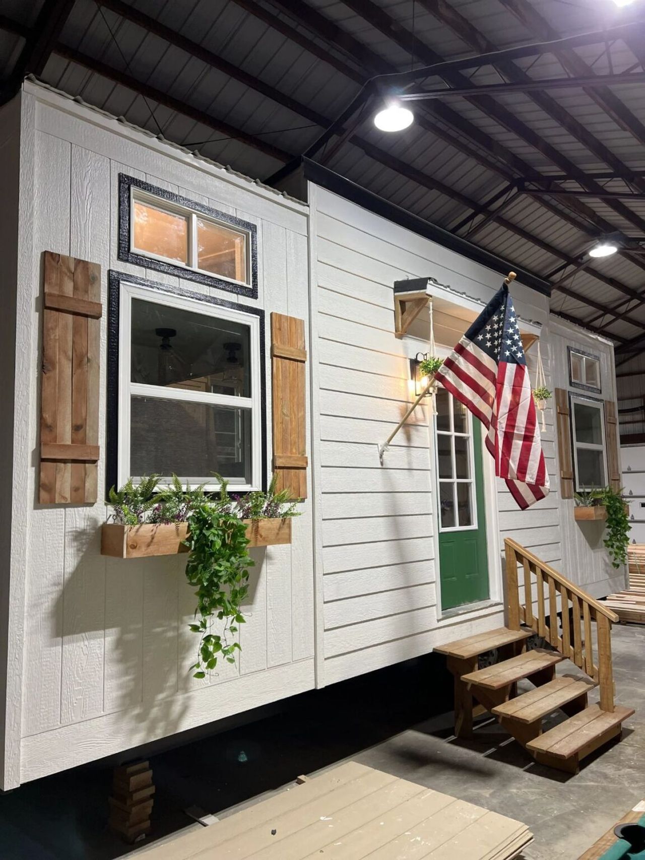 The Georgia Tiny House With Farmhouse Vibe has Twin Lofts
