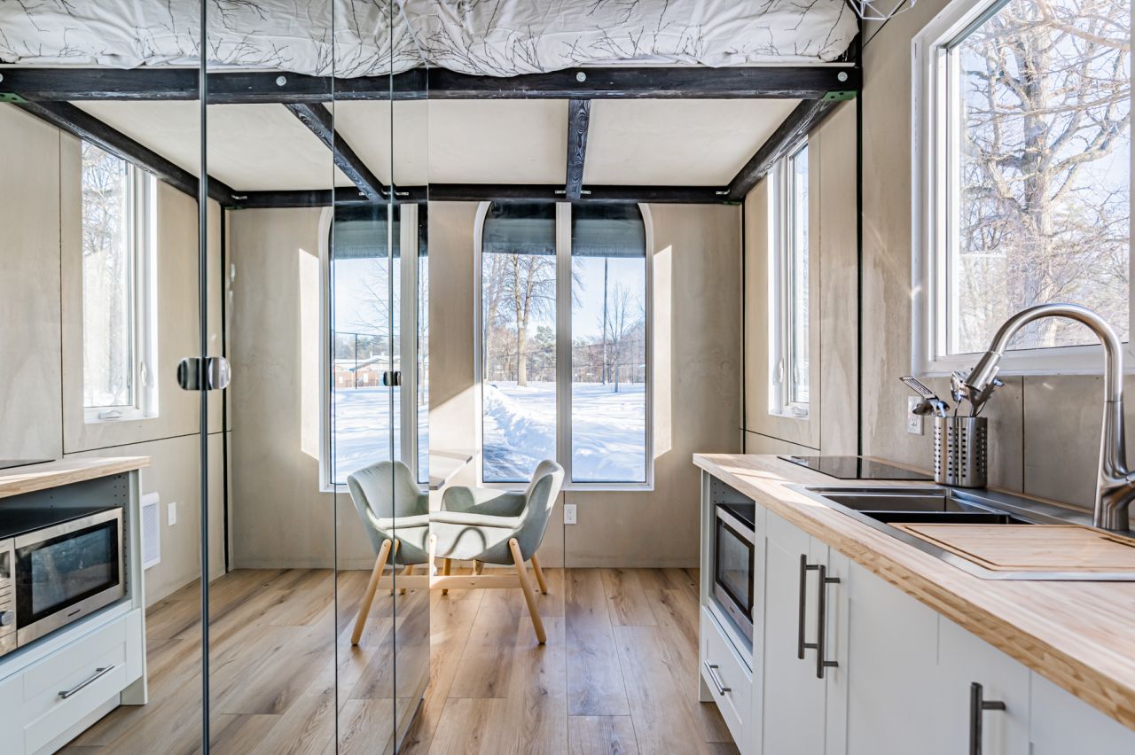 Elevate Tiny House With Ceiling Bed Feels Like Luxurious Condo