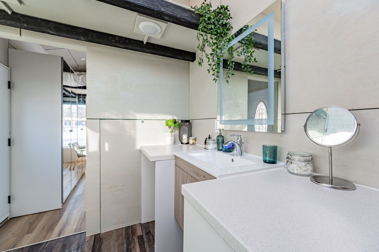 Elevate Tiny House With Ceiling Bed Feels Like Luxurious Condo