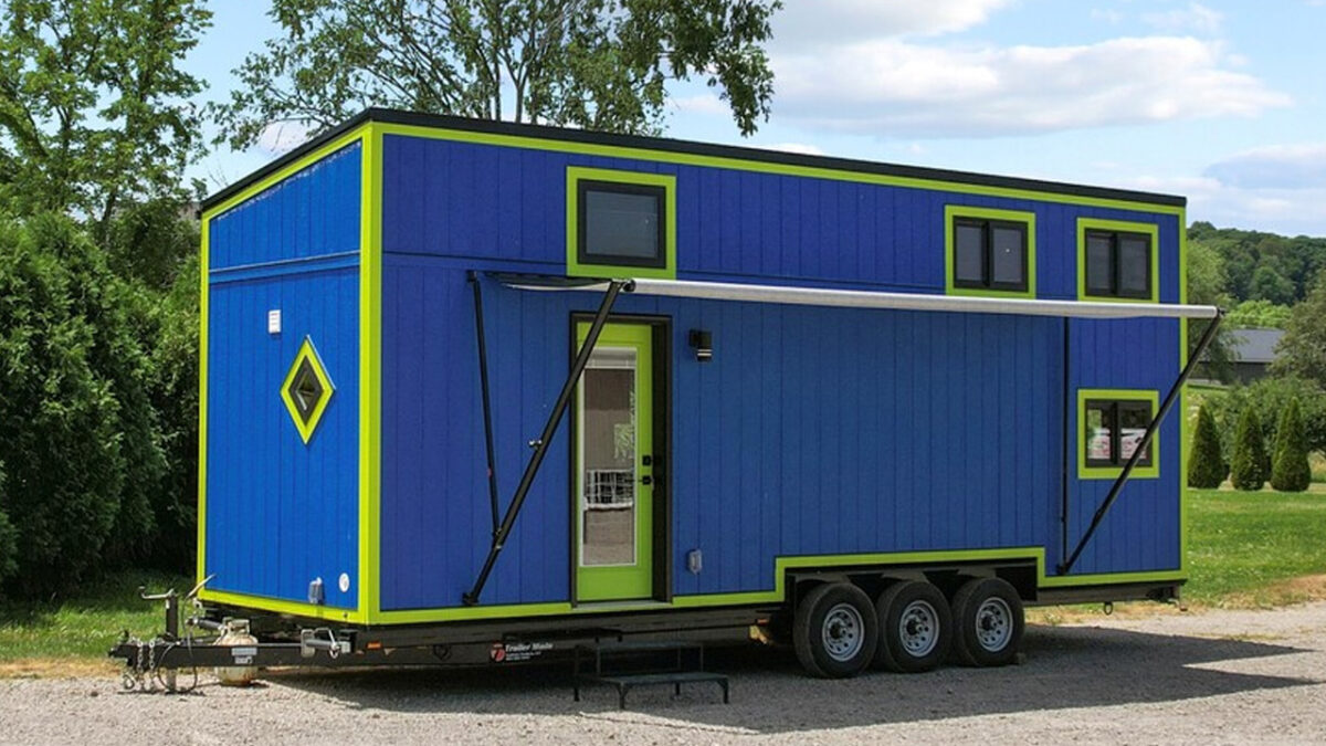 With Red Interior, MTL Rocket Tiny Home is Splashed Blue Outside