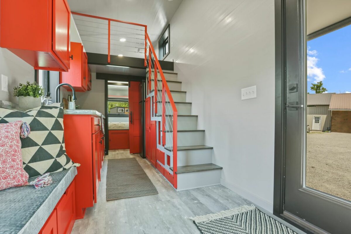 With Red Interior, MTL Rocket Tiny Home is Splashed Blue Outside