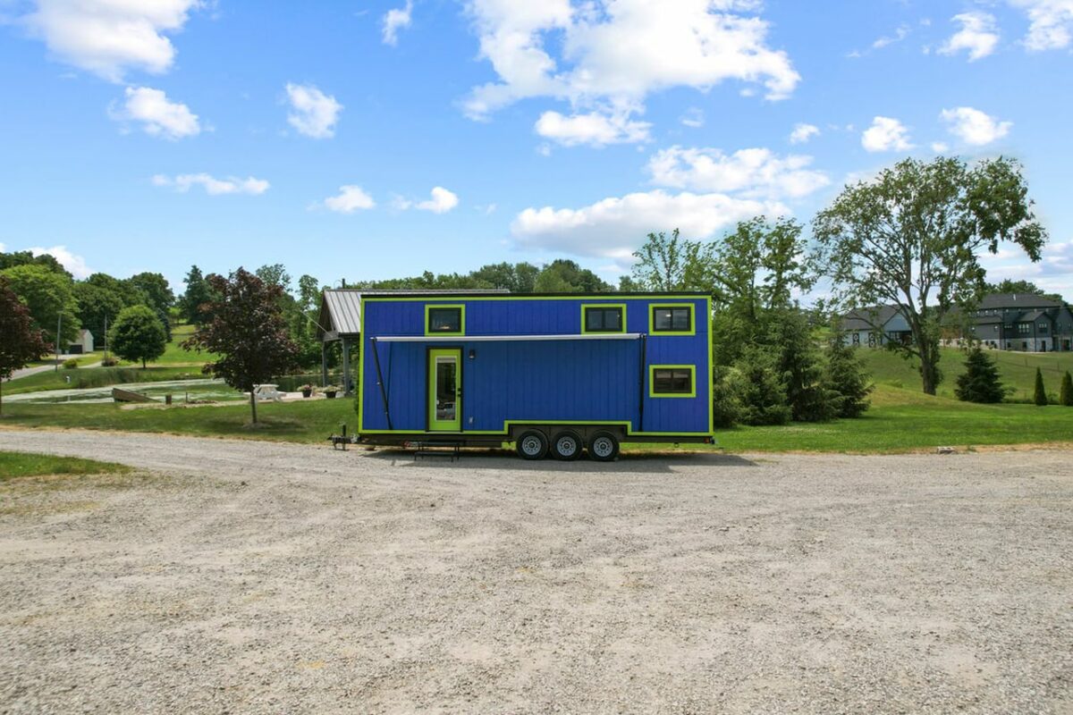 With Red Interior, MTL Rocket Tiny Home is Splashed Blue Outside