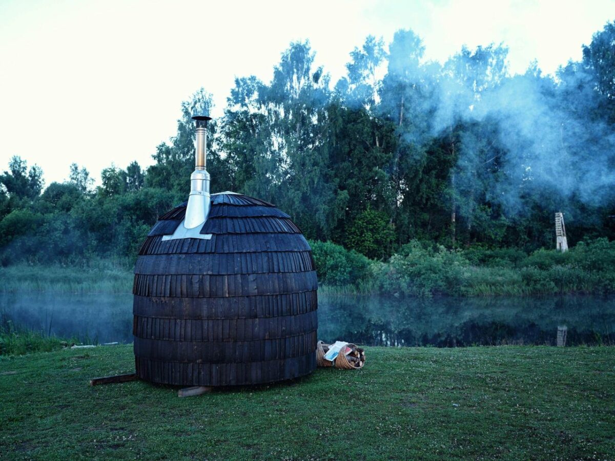 Iglusauna Prefab Sauna Blends in Nature With Stunning Shingles