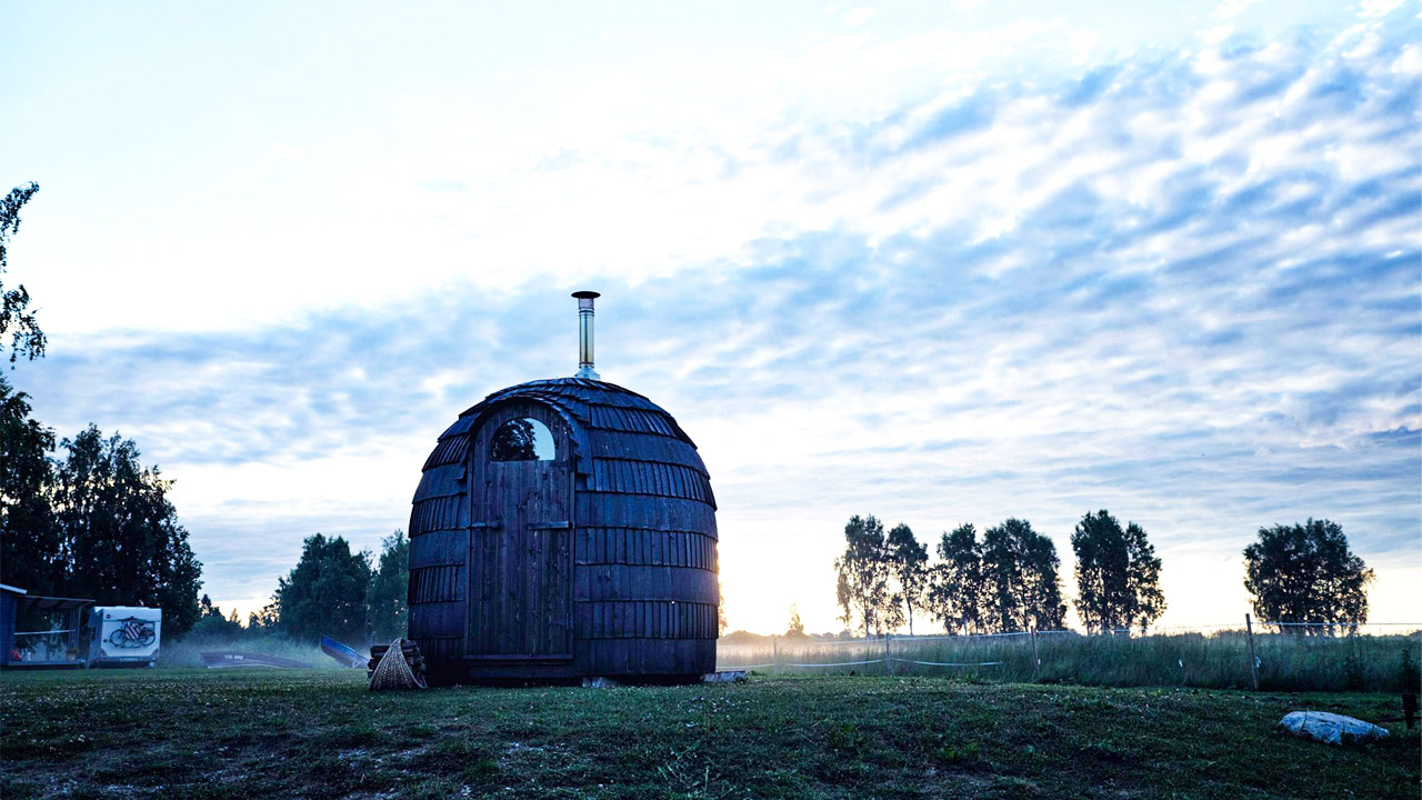 Iglusauna Prefab Sauna Blends in Nature With Stunning Shingles