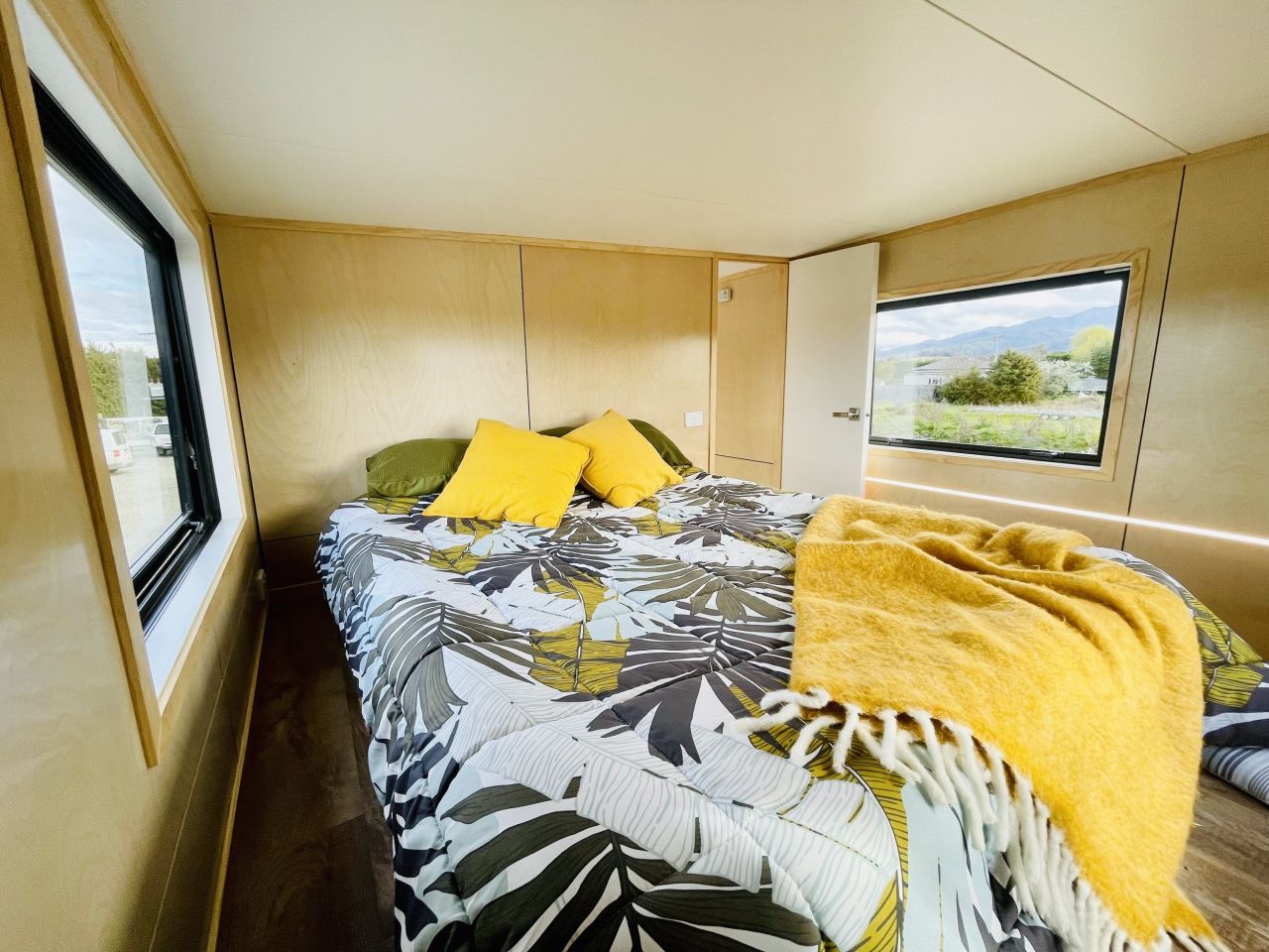 The Ruru Is A Spacious Tiny House With An Upstairs Lounge
