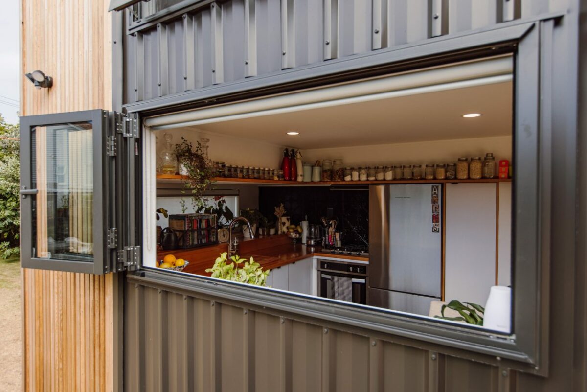 Britt Tiny House Features Walkway Connecting Loft Bedrooms