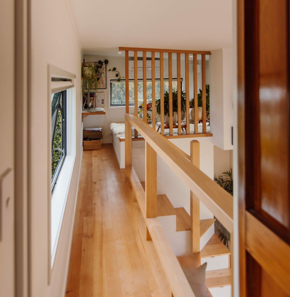 Britt Tiny House Features Walkway Connecting Loft Bedrooms