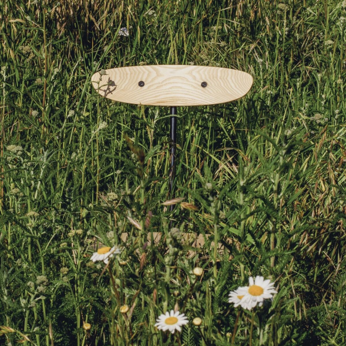 Daisee Chair is Three-Legged Sustainable Seat With Perfect Patina