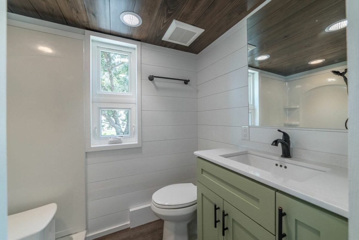 Elmore Tiny House Boasts Three Bedrooms and a Screened Porch