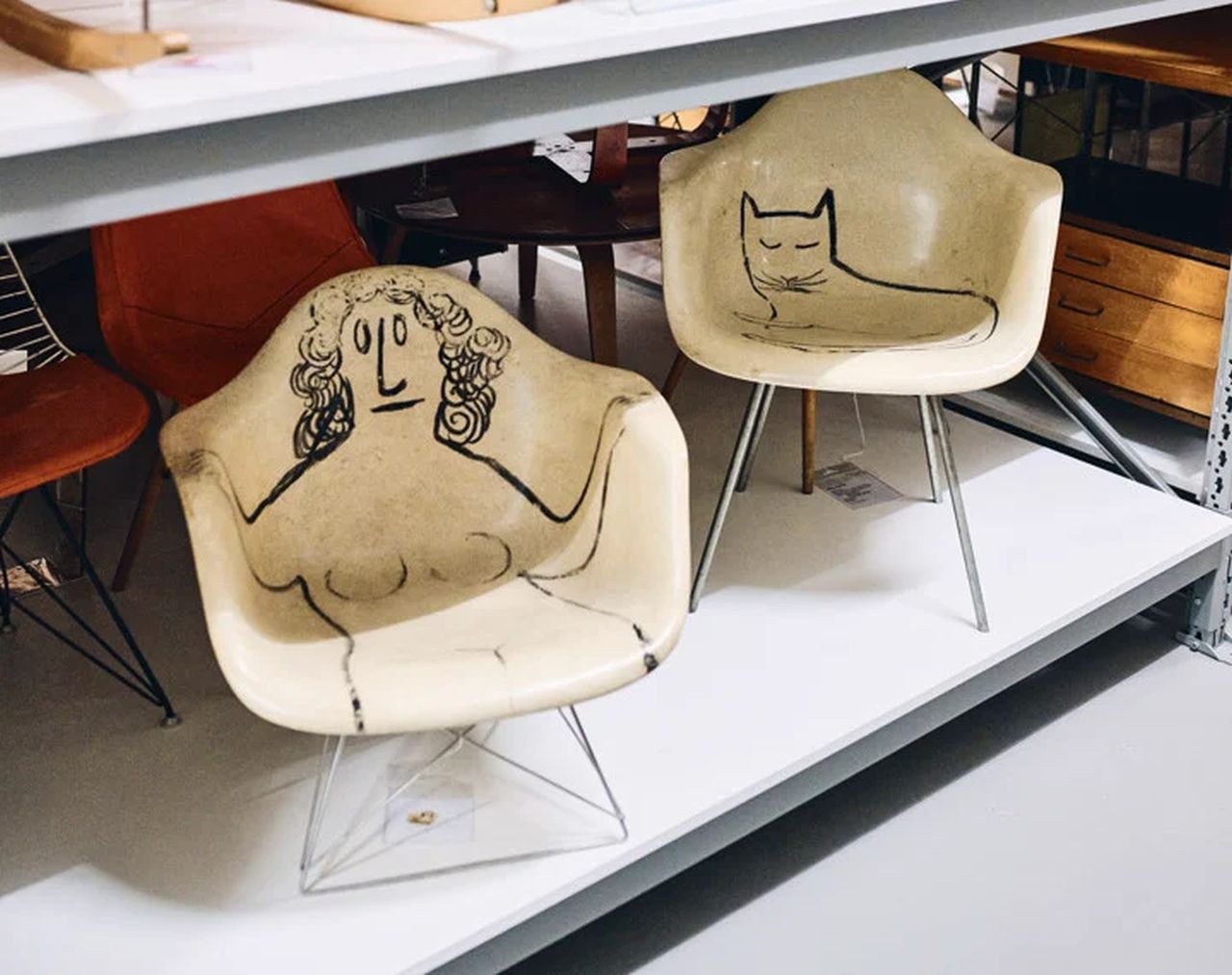 Vitra x Herman Miller Recreate Eames Fiberglass Armchair With Steinberg Cat