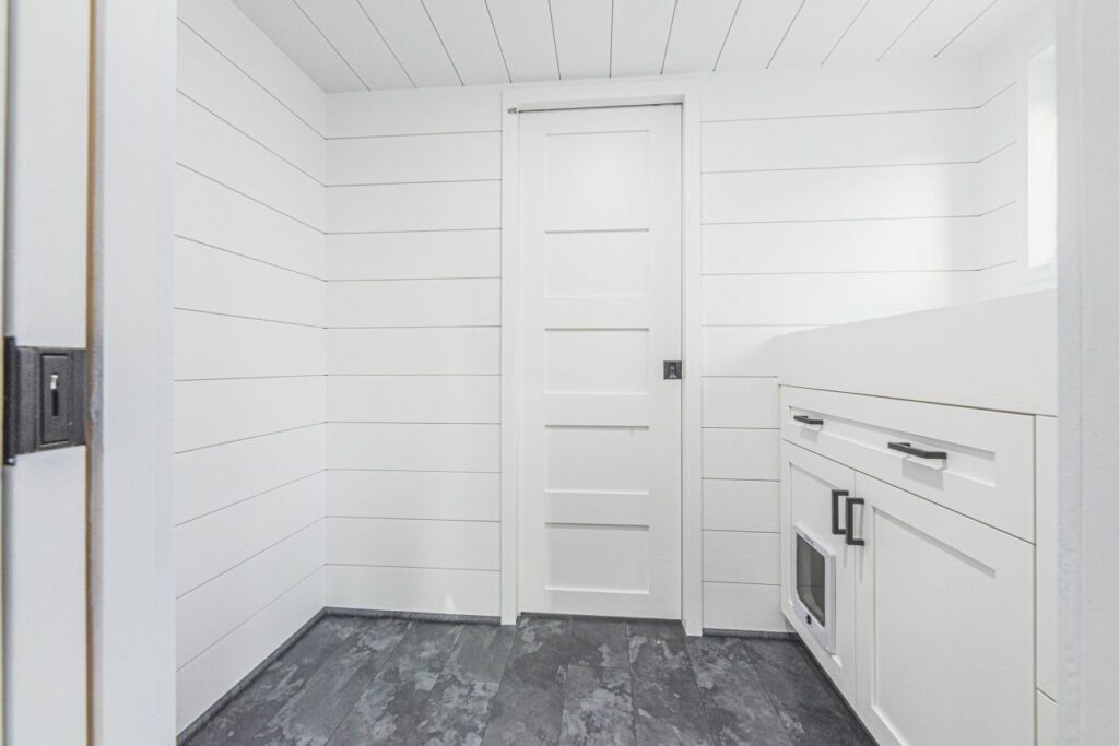 Pet-Friendly Cavin Tiny House Features a Raised Living Room