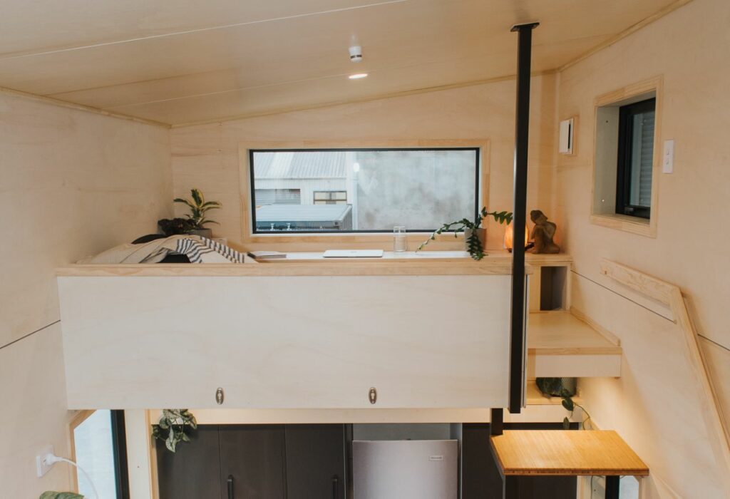 River Bank Tiny Home has Lofts for Office & Bedroom With Skylight