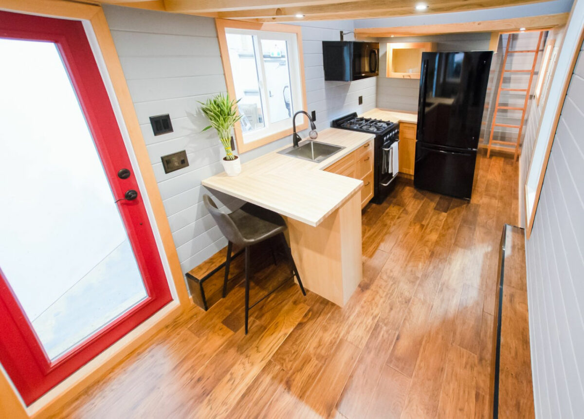 Surfbird Tiny House With Bathtub has Two Storage Bedroom Lofts