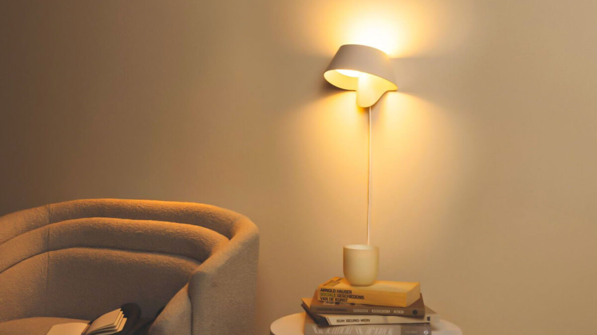 Fold Wall Light Flaunts Curved Design Creating Warmth and Glow
