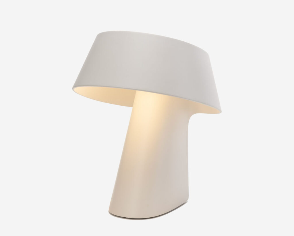 Fold Wall Light Flaunts Curved Design Creating Warmth and Glow