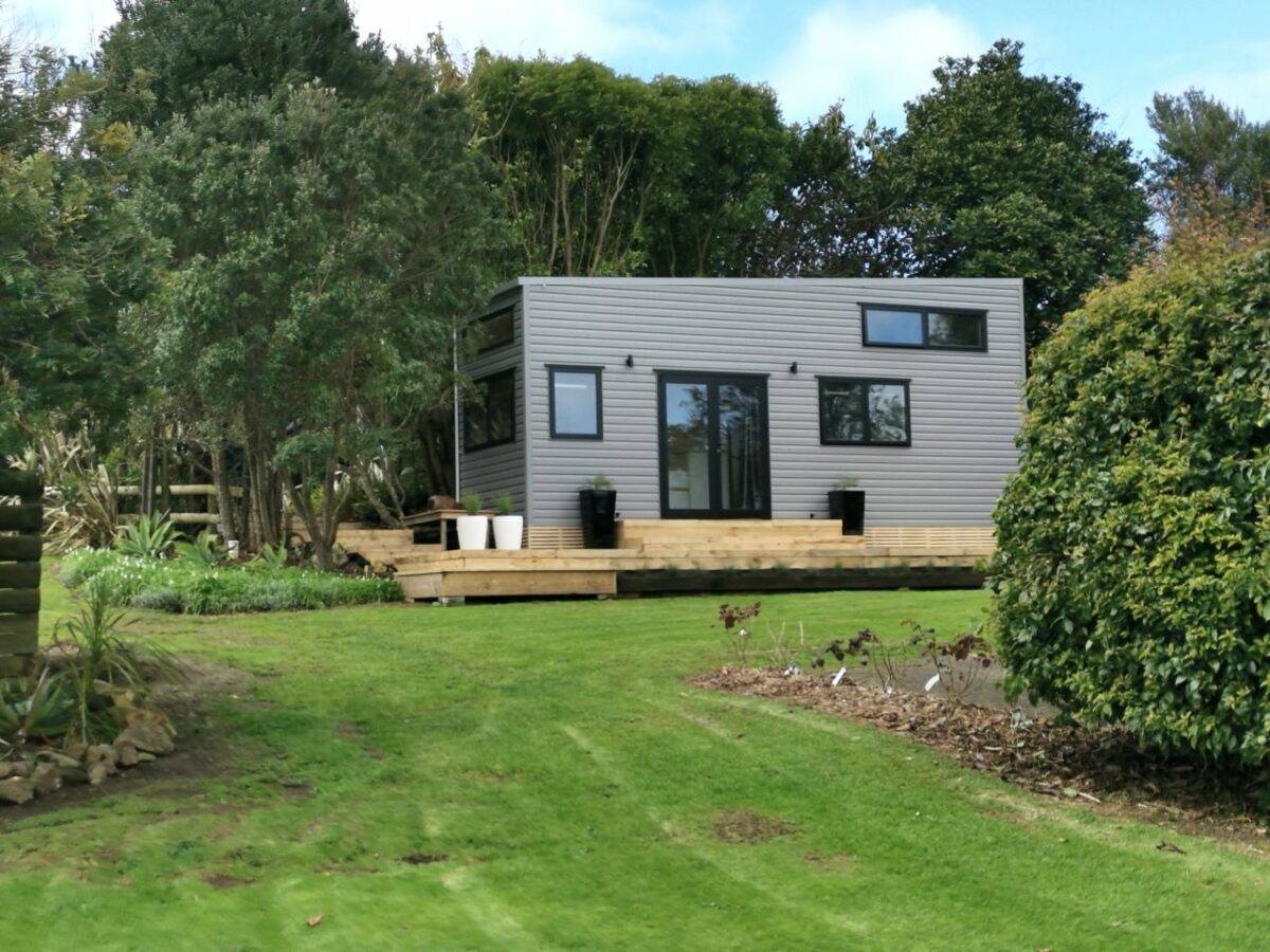 Green Hill Farm Tiny House Features a Loft Bedroom With TV