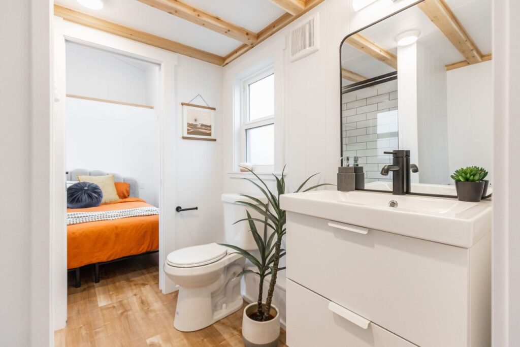 Calliope Tiny House has 3 Bedrooms, L-Kitchen, & Spacious Bath