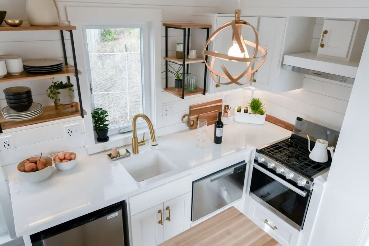 $250K Cascade Mini Tiny House has Spiral Stairs to Rooftop Deck